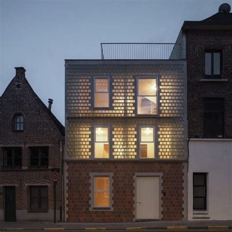 Glass Brick Facade Pulls Light Into Belgian Infill Home