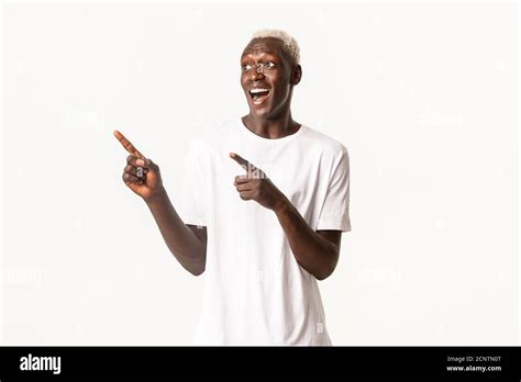 Portrait Of Excited Handsome African American Blond Guy Looking Happy