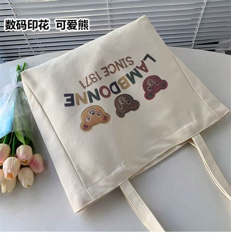 旅游帆布包女单肩2024新的款大容量学生上课书包ins文艺带娃布袋 阿里巴巴