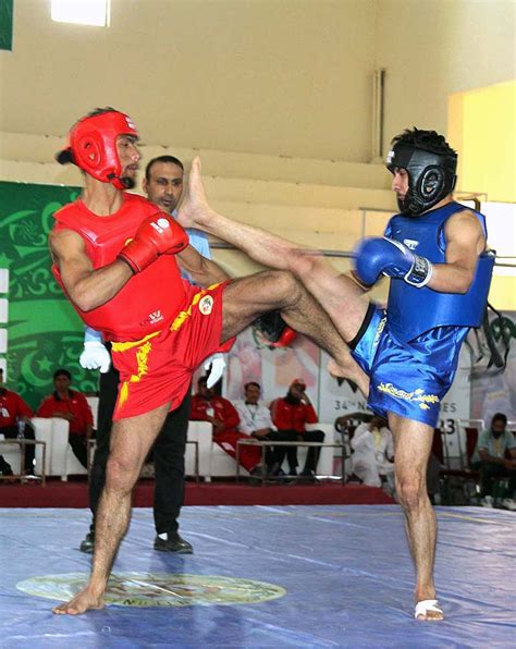 Players In Action In Mens Wushu Fight Between Pakistan Army And