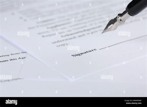 Signing Notary Document With Fountain Pen Closeup Space For Text Stock Photo Alamy