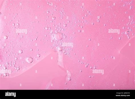 Macro Photography Of Bubbly Smear On Raspberry Pink Background Stock