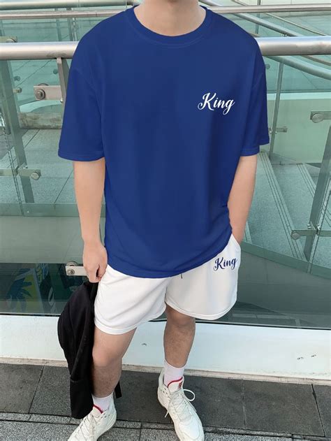 Manfinity Hypemode Shorts con cordón en la cintura y camiseta gráfica