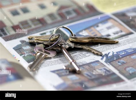 House Keys On Property Pages Stock Photo Alamy
