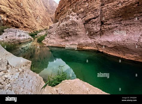 Turquoise Water Flowing Through The Wadi Shab Canyon Wadi Ash Shab