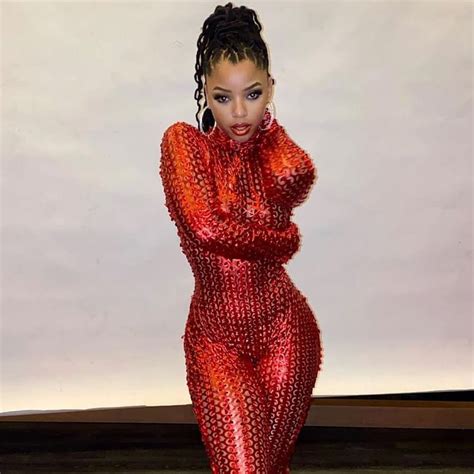 See Chloe Bailey Wearing A Red Cutout Jumpsuit On Instagram Ps Fashion
