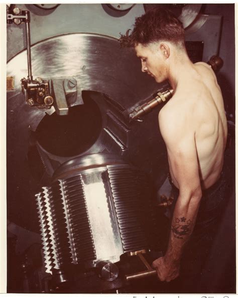 Fire Controlman First Class E M Smith Opening The Breech Of One Of Uss Missouris Bb 63 Nine