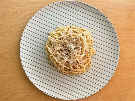 Download Italian Cacio E Pepe Pasta Minimalistic Flat Lay Display Wallpaper