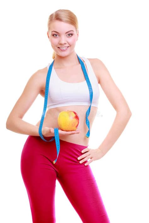 Diet Fitness Woman Fit Girl With Measure Tape And Apple Fruit Stock