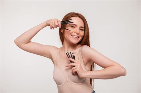 Premium Photo A Woman With A Pair Of Scissors In Her Hand Is Holding A Pair Of Scissors