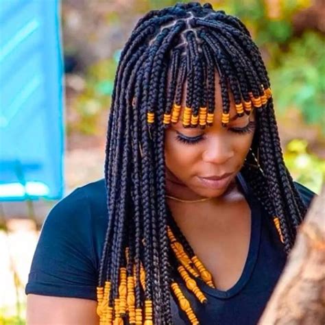 Medium Length Braids With Full Bangs On Black Ladies Elegant Hairstyles