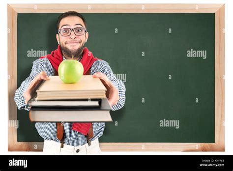 Nerd Posing With Books Stock Photo Alamy