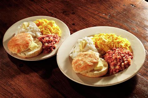 Scrambled Eggs With Corned Beef Hash Grits And American Biscuits