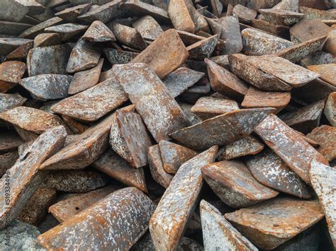 Cast Iron Obtained By Melting Iron Ore Formed Into Ingots Of Impure