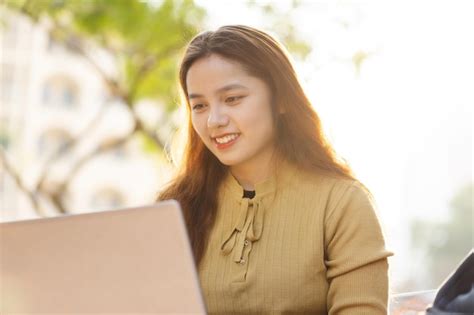Premium Photo Portrait Of A Beautiful Asian Female Student At University