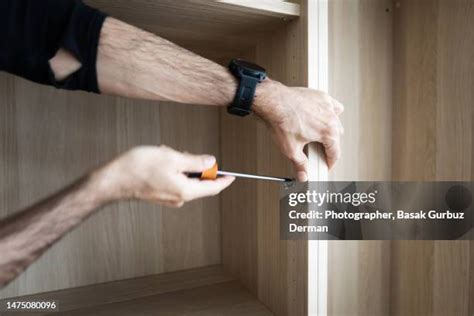 Assembling Cabinet Photos And Premium High Res Pictures Getty Images
