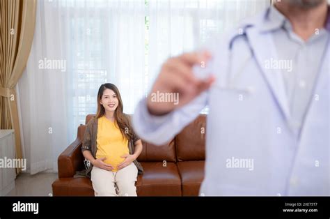 Obstetrician Gynecologist And Vaccination Needle Or Pregnant Woman