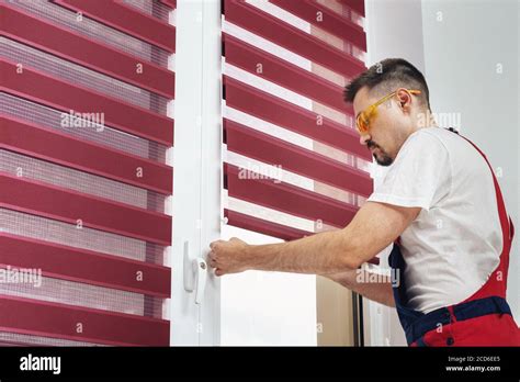 Installing Blinds Hi Res Stock Photography And Images Alamy