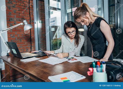 Creative Team Of Graphic Designers Working On New Project Using Color