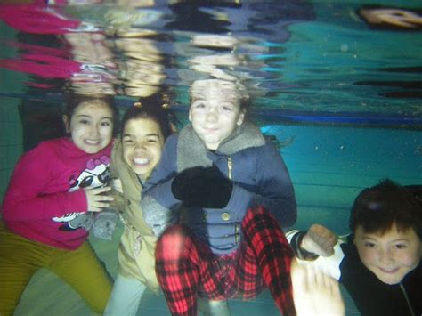 Girls Having Fun Underwater With Winter Clothes Underwater Drawing