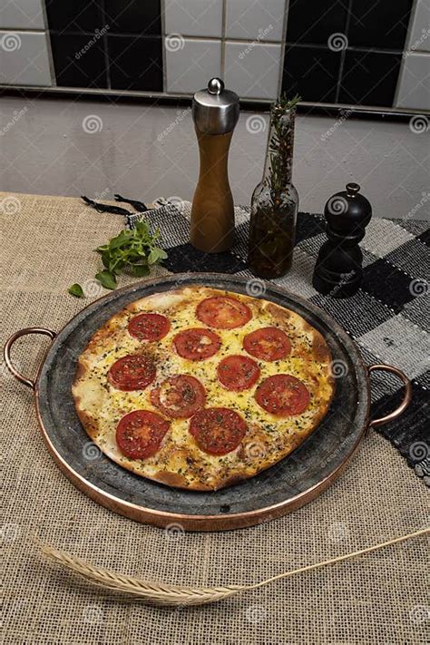 Neapolitan Brazilian Pizza With Mozzarella Cheese And Tomato Slices