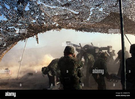 Left Rear View Camera Under Camouflage Netting An M198 155 Mm