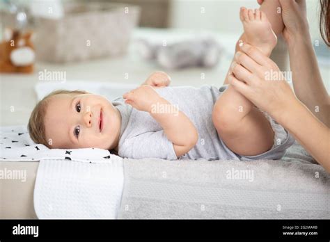 Changing Diapers Of Hi Res Stock Photography And Images Alamy