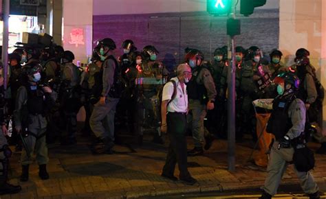 Hundreds March In Hong Kong As Leader Urges Stability