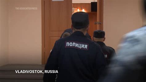 Us Soldier Arrested On Theft Charges Arrives To Court In Russias