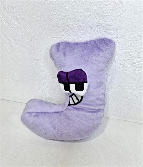 Мягкая игрушка плюшевая алфавит лор Alphabet Lore буква J 20 см сиреневая — цена 130 грн в