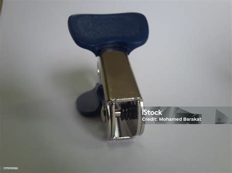 Blue Metal Staple Extractor Remover Tool On White Background Stock