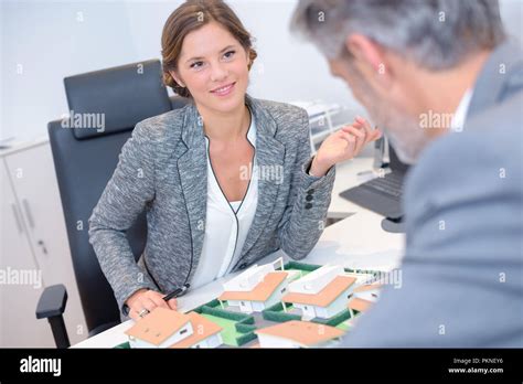 Architect With A Client Stock Photo Alamy