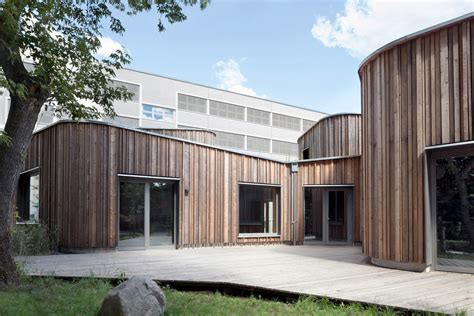Mono Architekten Adds Timber Buildings With Green Roofs To School