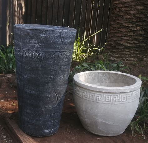 Detail Range Concrete Pots With Aztec Designs