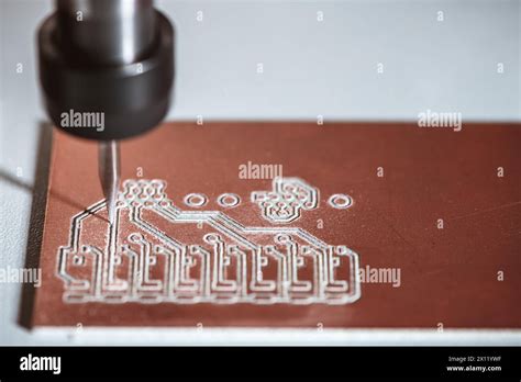 Machine With Numerical Control CNC Carries Out Milling Of Printed