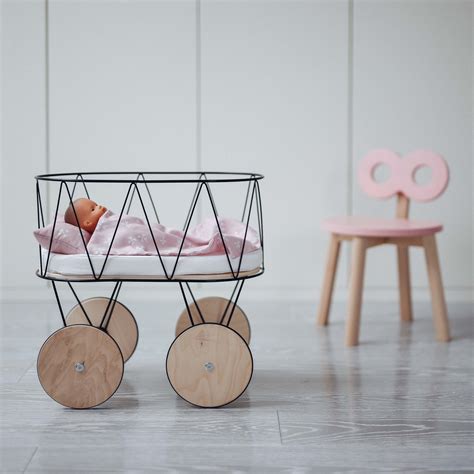 Chic Dolly Cot Impresses With Its Minimalist Design And Sophisticated