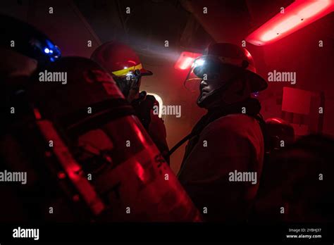 Sailors Fight A Simulated Fire During A General Quarters Drill Aboard