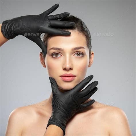 Doctor Checks A Skin Before Plastic Surgery Face Skin Check Before