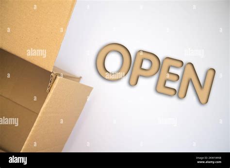 Open Word With Cardboard Box Brown Folded Card Box Stock Photo Alamy