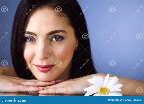 Portrait Of Smiling Brunette Woman Looking At Camera Beauty Concept