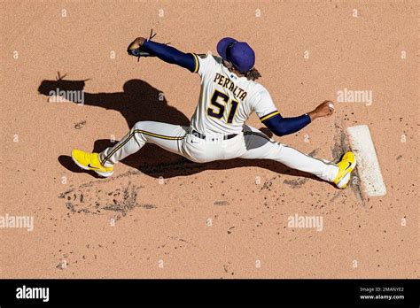 Milwaukee Brewers Starting Pitcher Freddy Peralta Throws During The