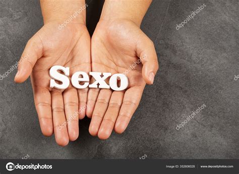 Hands Holding Wooden Letters Word Sexo Spanish Language Stock Photo By Luisecheverriurrea