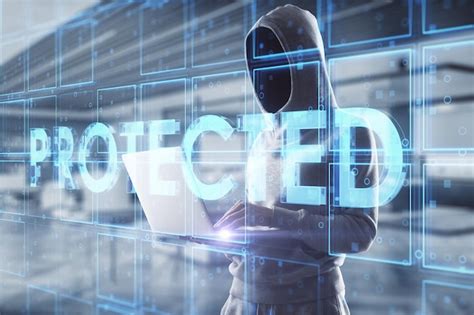 Premium Photo Hacker In Office Using Laptop With Creative Blue Cubes Protected Text Hologram