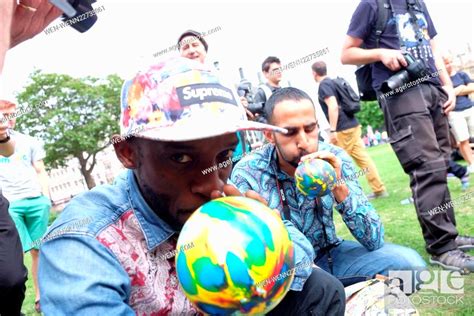 Protesters Gather In Parliament Square For A Mass Inhalation Of Nitrous
