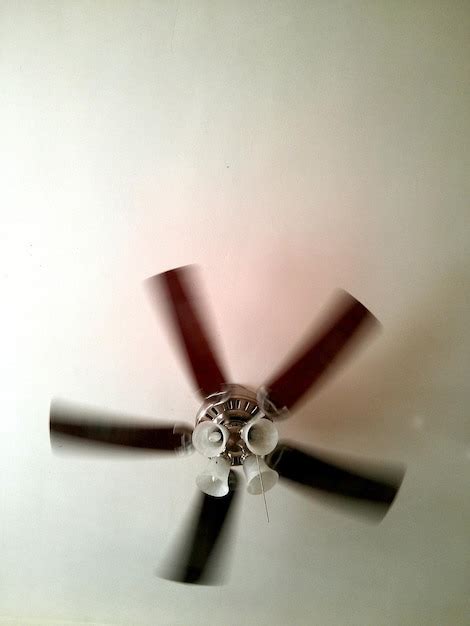 Premium Photo Directly Below Shot Of Moving Fan On Ceiling