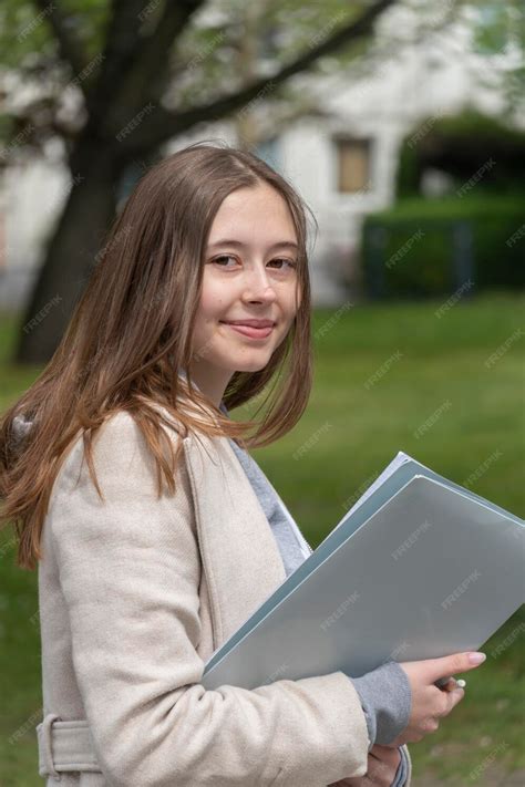 Premium Photo Young Student Posing Smiling College Student On Her Way