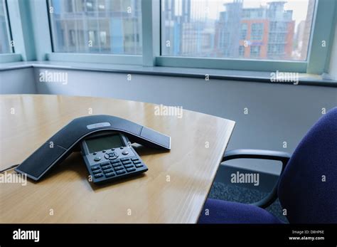 A Cisco Polycom Ip Spider Conference Phone In A Modern Office Stock