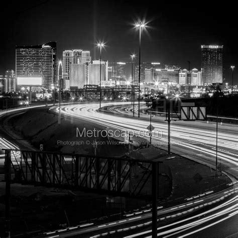 The Las Vegas Skyline Over Interstate 15 At Night Black And White