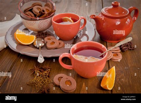 Heisser Tee Gluehwein Und Plaetzchen Zur Weihnachtszeit Stock Photo