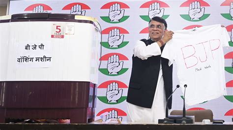 Washing Machine On Dais Cong Taunts Bjp Over Clean Chit To Leaders